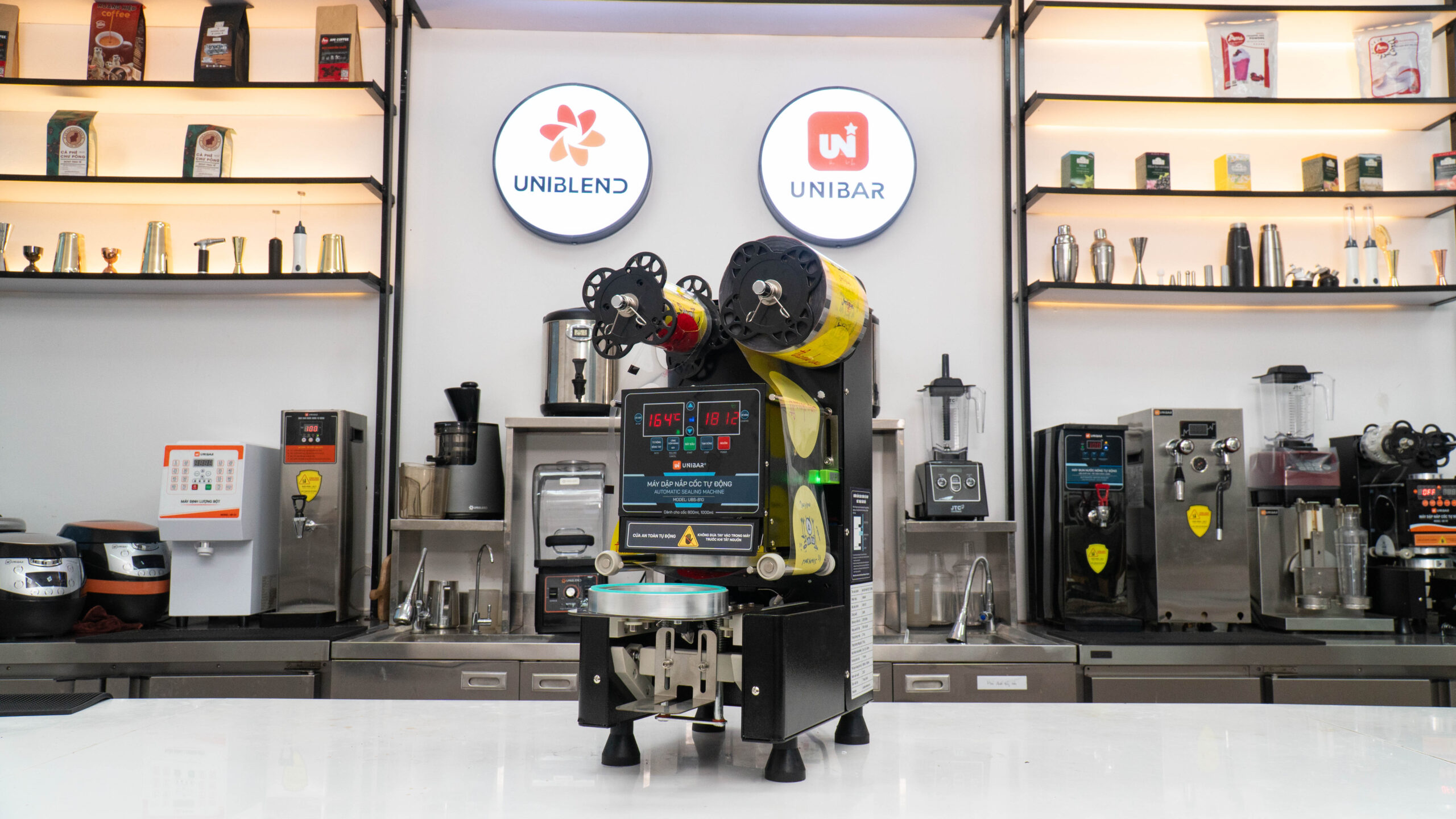 MÁY DẬP NẮP CỐC TỰ ĐỘNG UNIBAR UBS-810 - UNIVIETNAM